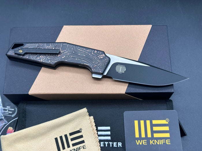 We Knives + Tashi Bharucha - OAO/Black Titanium Handle + Copper Foil C