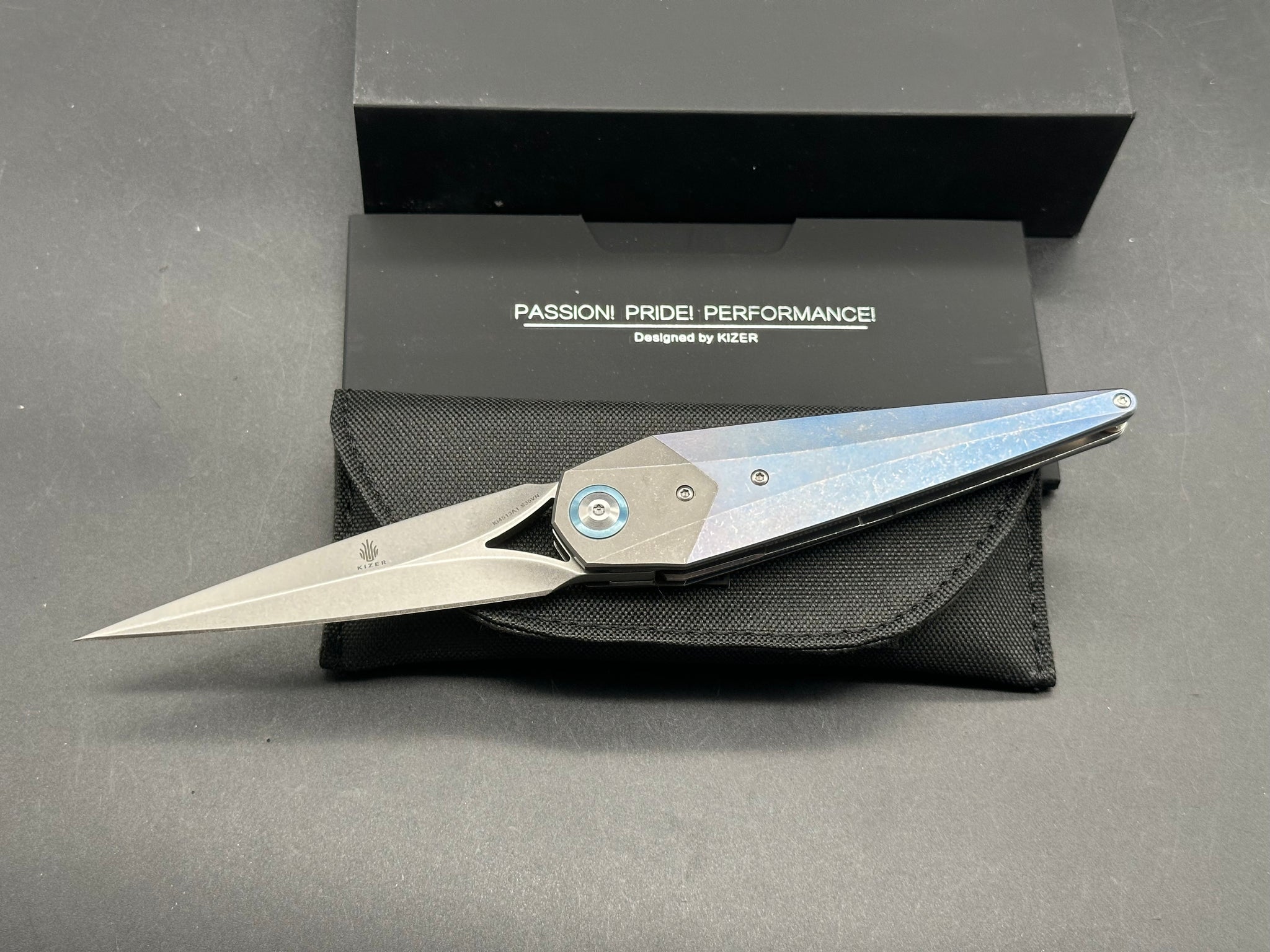 Kizer Soze, Elisha Isham design S35VN blade, titanium handle