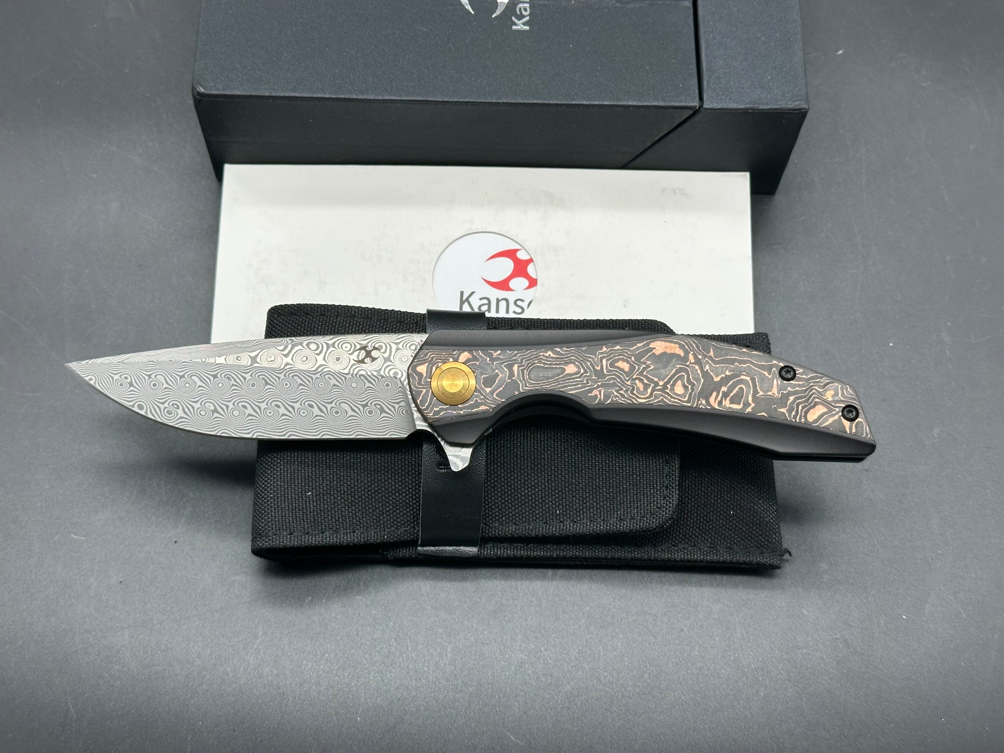 KANSEPT ACCIPITER TITANIUM/COPPER CF HANDLE DAMASCUS BLADE