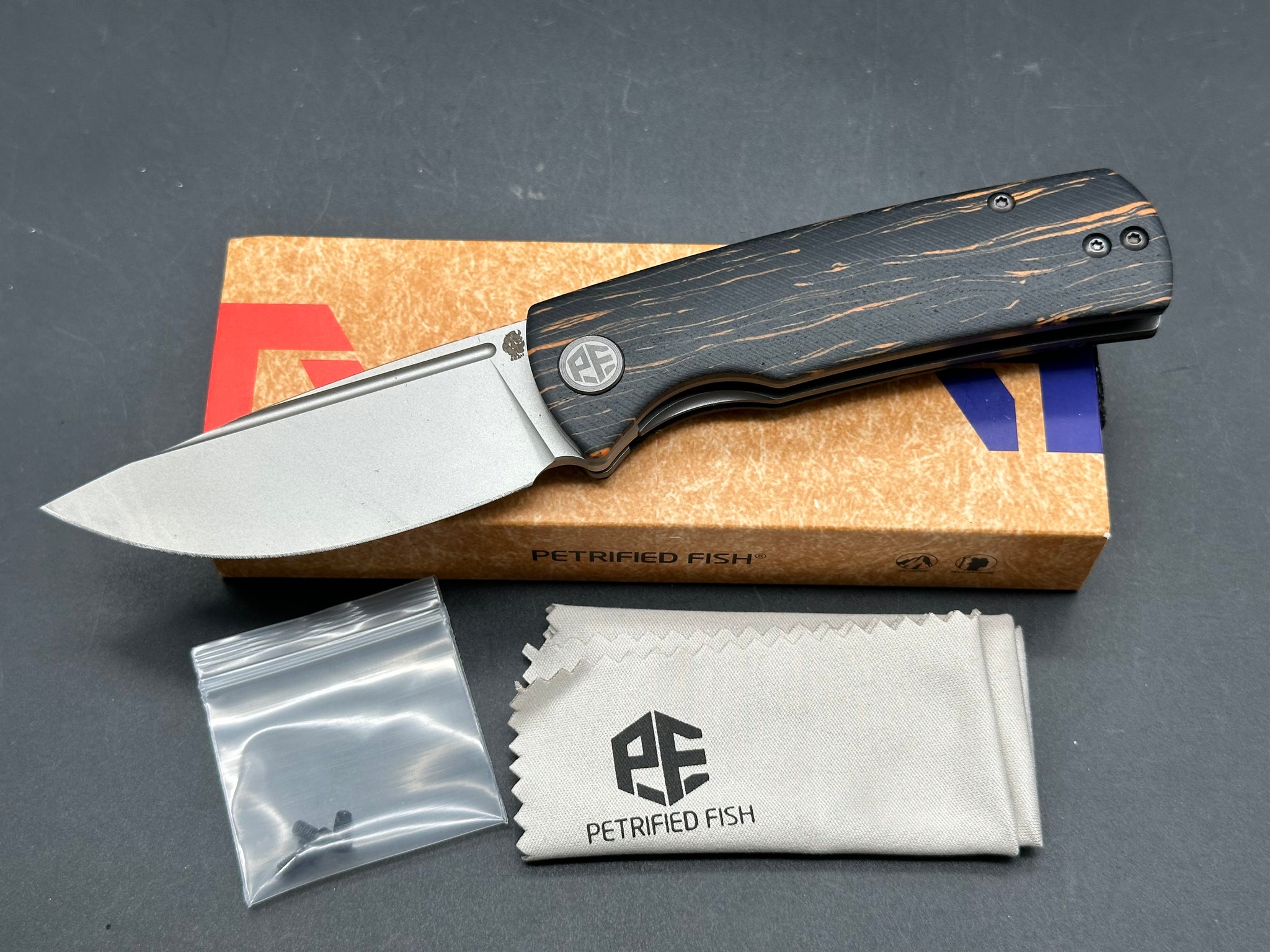 PETRIFIED FISH MINI BELUGA FRONT FLIPPER ORANGE GMASCUS HANDLE 14C28N