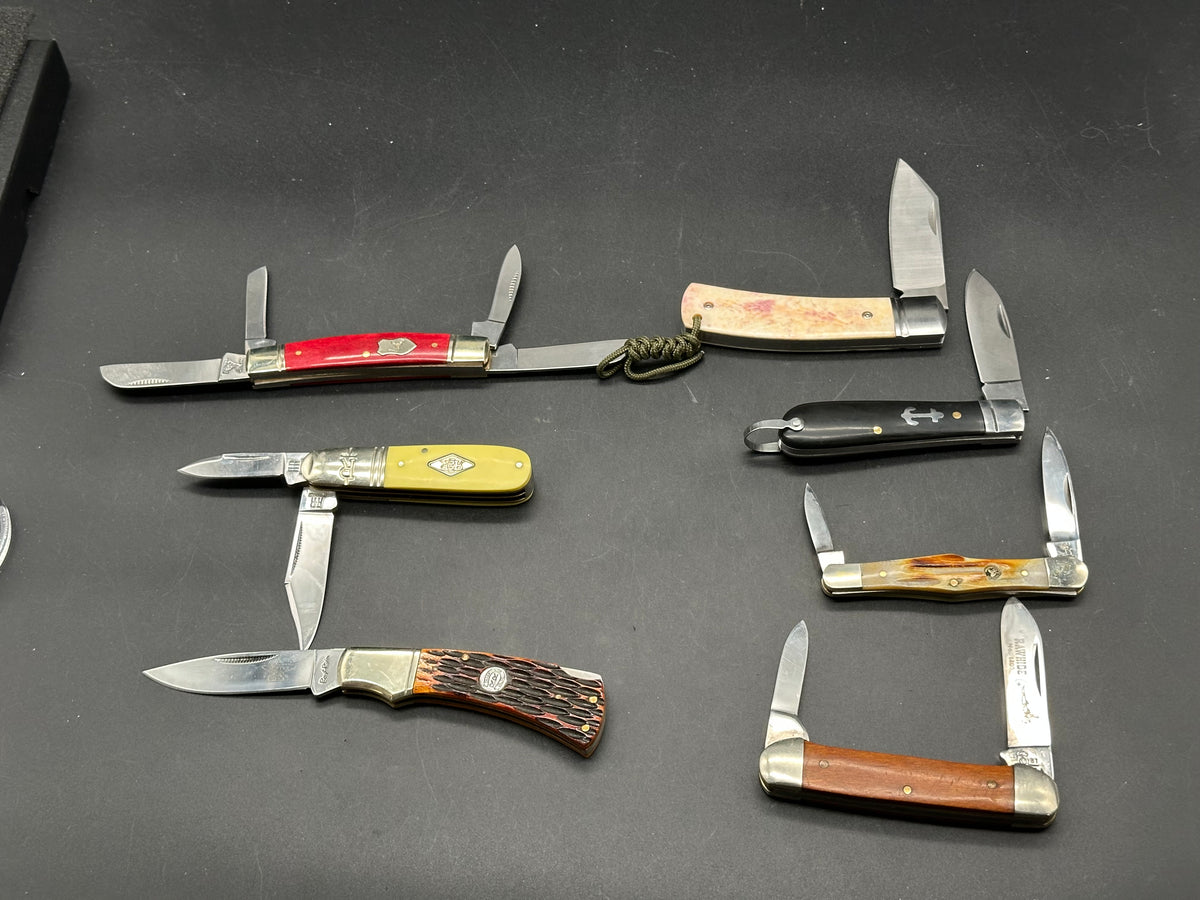 7 knife package deal Queen Cutlery , Rough Rider,White Tail, German Cr